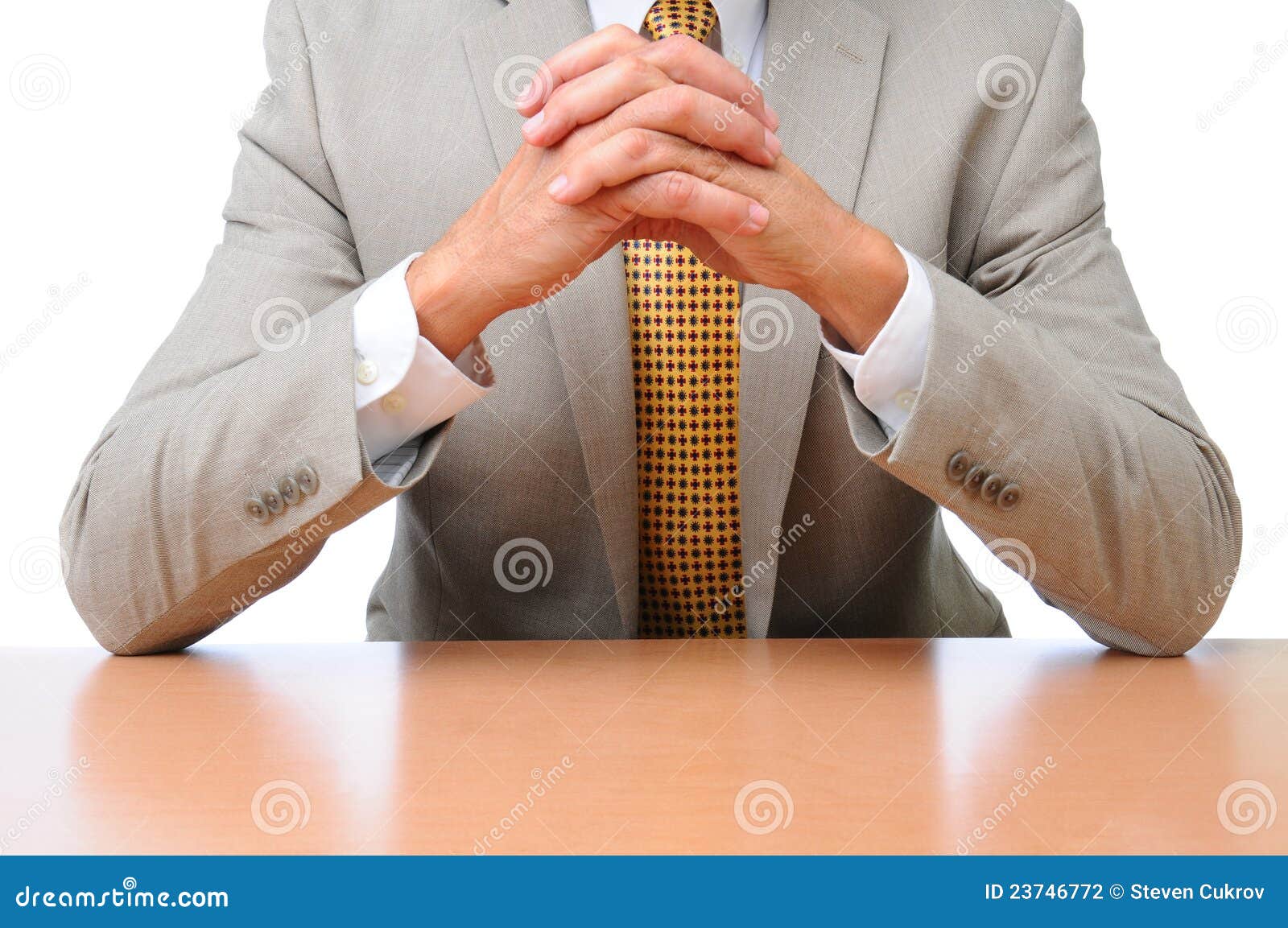 Businessman Elbows On Desk Hands Folded Stock Photography - Image: 23746772 Businessman Elbows On Desk Hands Folded Stock Photography - Image: 23746772