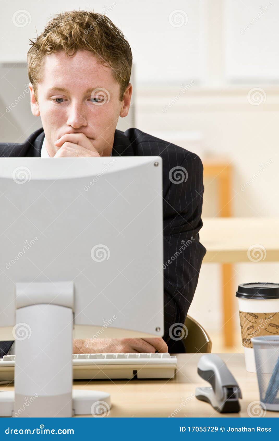 Businessman Staring At Computer Royalty Free Stock Images - Image: 17055729 Businessman Staring At Computer Royalty Free Stock Images - Image: 17055729