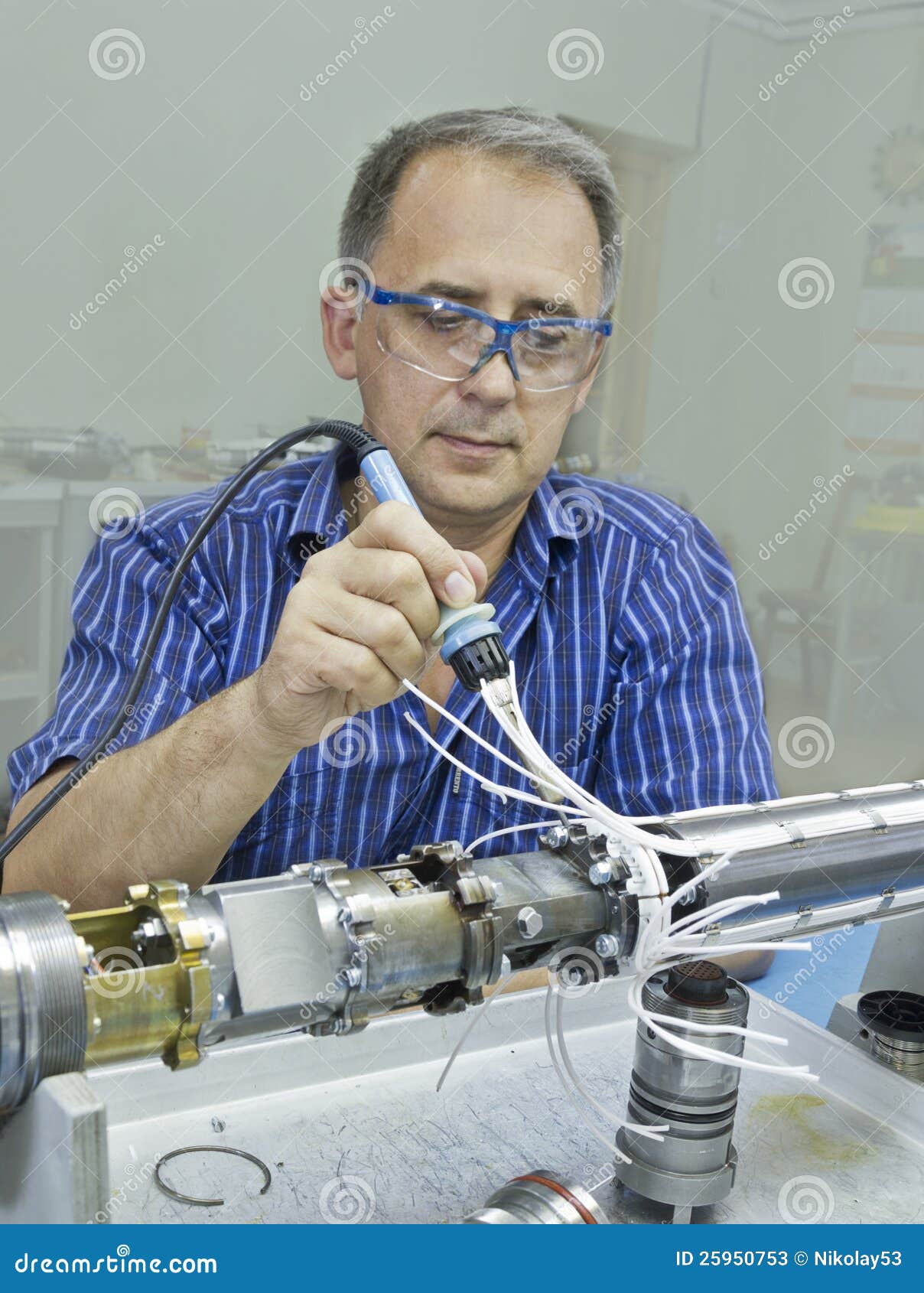 A Highly Skilled Worker Stock Photos - Image: 25950753 A Highly Skilled Worker Stock Photos - Image: 25950753