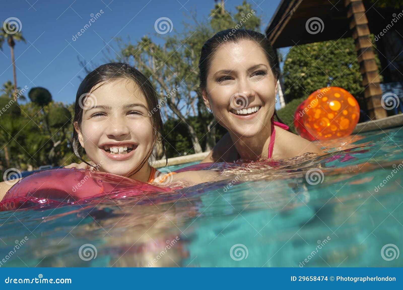 Mother And Daughter Enjoying In Pool Stock Images Image 29658474
