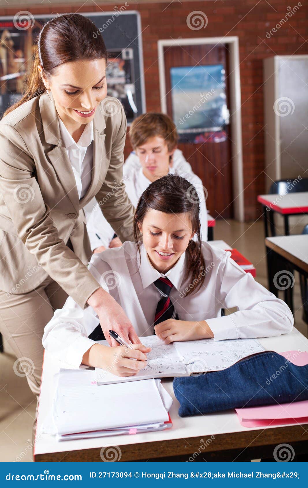 Teacher Helping Student Stock Images - Image: 27173094 Teacher Helping Student Stock Images - Image: 27173094