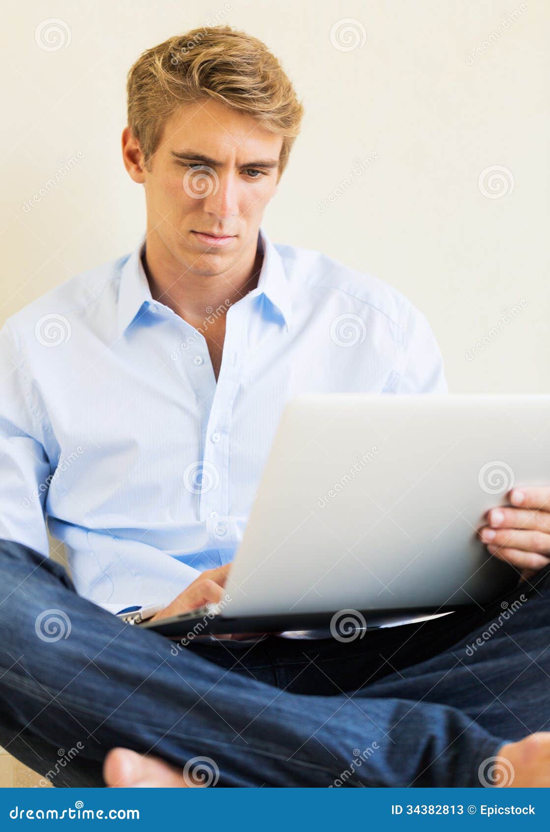 Young Man Working On Laptop Computer At Home Stock Photos - Image: 34382813 Young Man Working On Laptop Computer At Home Stock Photos - Image: 34382813