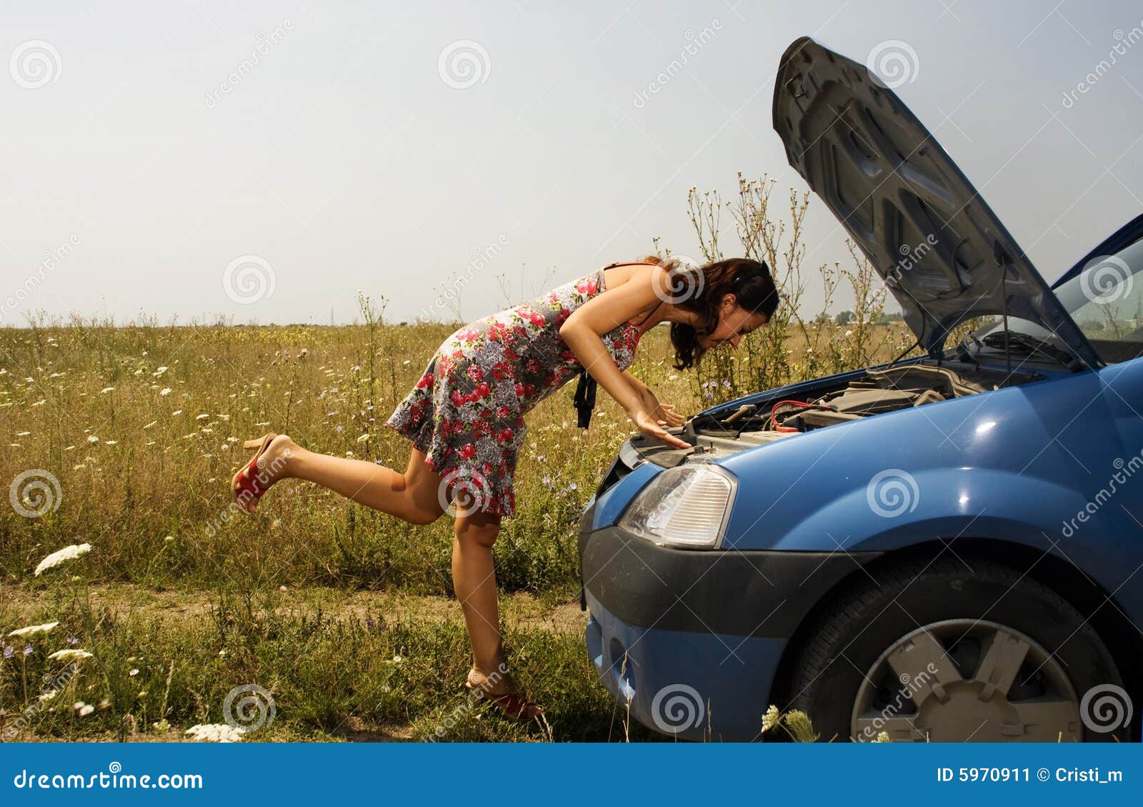 Young Woman Bent Over A Car Stock Image Image 5970911