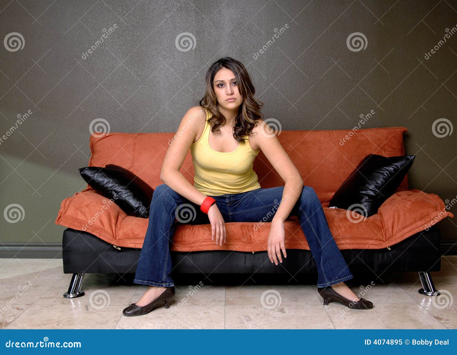 Young Woman Sitting On Sofa Royalty Free Stock Photo - Image: 4074895 Young Woman Sitting On Sofa Royalty Free Stock Photo - Image: 4074895