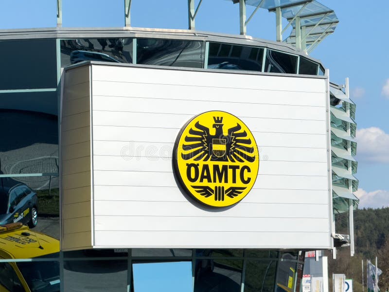 öamtc Logo on Modern Building Exterior Reflecting Blue Sky and ...