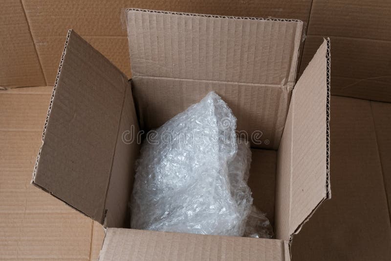 Ð¡ardboard Box with Bubble Wrap Stock Image - Image of fragile ...