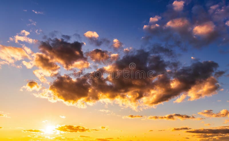Ð¡loudy Sky Illuminated by the Rays at Sunset or Sunrise Stock Photo ...