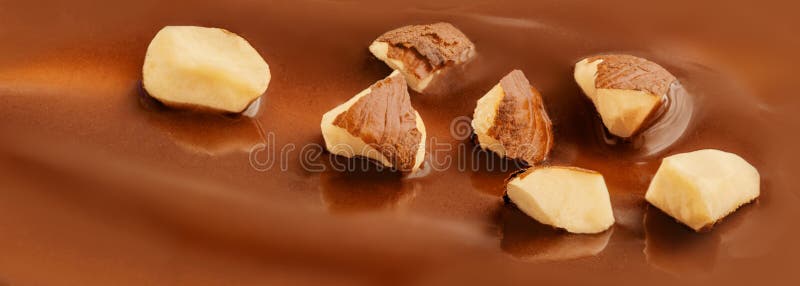 Â Melted Chocolate Texture Background with Nuts. Hazelnut Chocolate ...