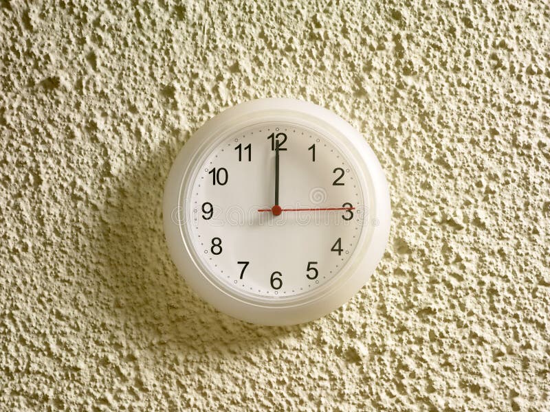 12.00 pm on the clock stock image. Image of hanging, clock - 1927391
