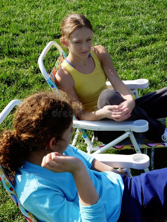 2 girls in the park stock photo. Image of grass, cute, informal - 81734