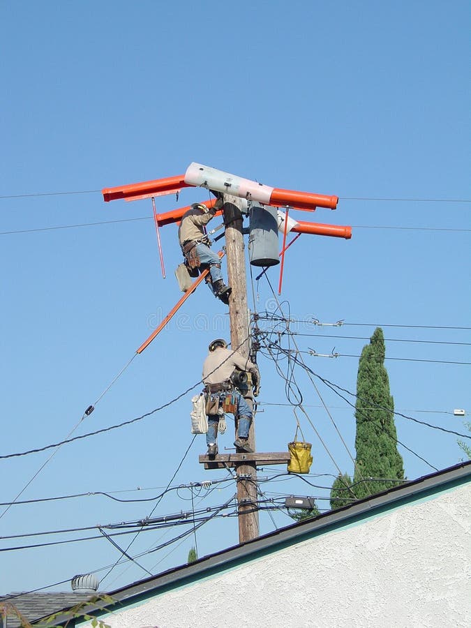 Power Lineman Working Together in Taiwan, Vertical Editorial ...