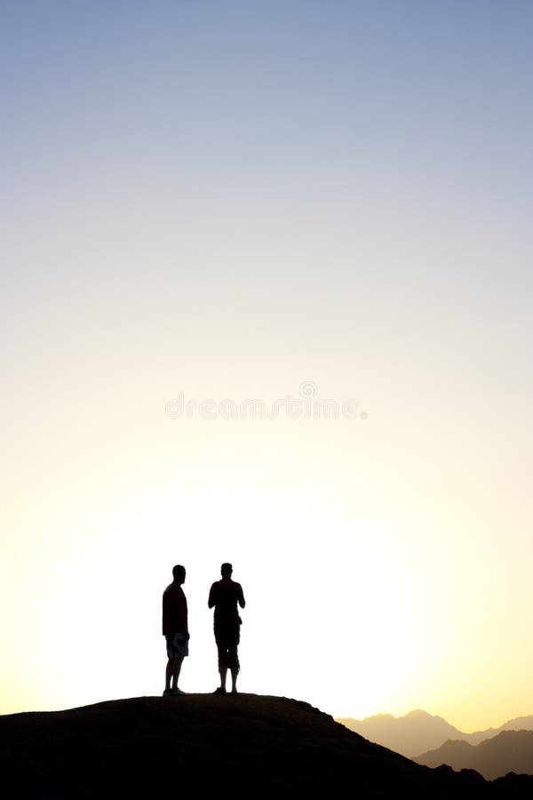 2 People Standing on Top of a Mountain Stock Image - Image of ...