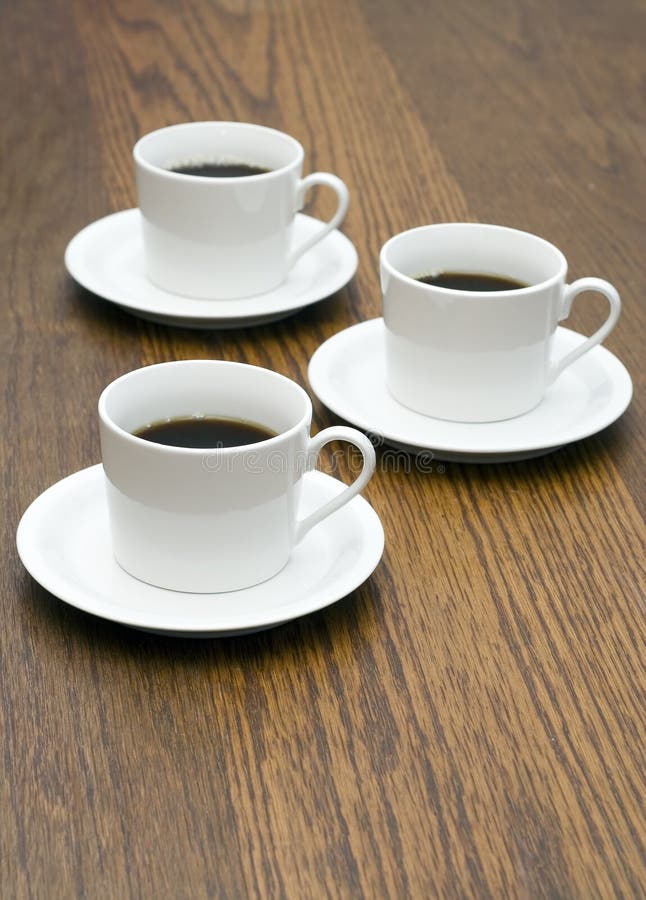 3 Coffee Cups on Wood Table Stock Photo - Image of crema, close: 9814640