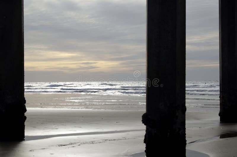 3 Columns stock image. Image of ocean, clouds, water, sand - 562173