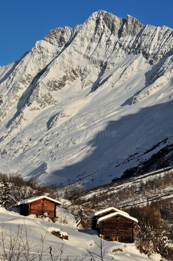 3 Log Cabins in an Empty Valley Stock Image - Image of wood, rocks: 7250893