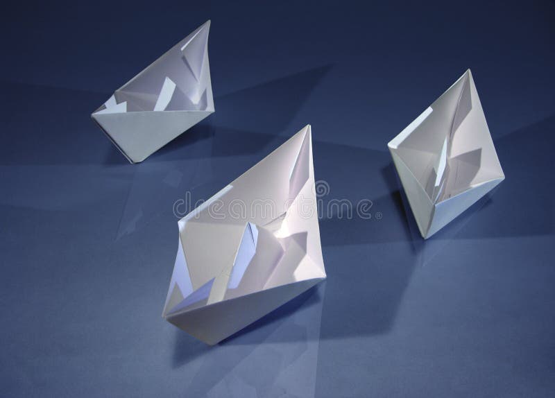 3 paper boats on blue stock image. Image of paper, idea - 50229