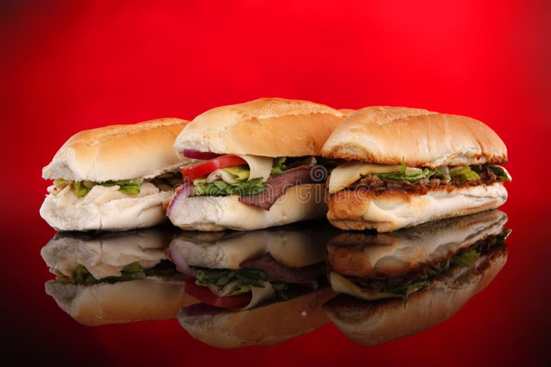 3 Popular Sandwiches on Red Stock Image - Image of baked, chicken: 9674769