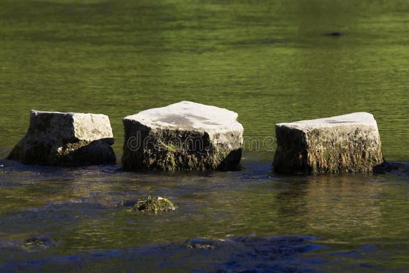 3 stepping stones in river stock photo. Image of shallow - 202942