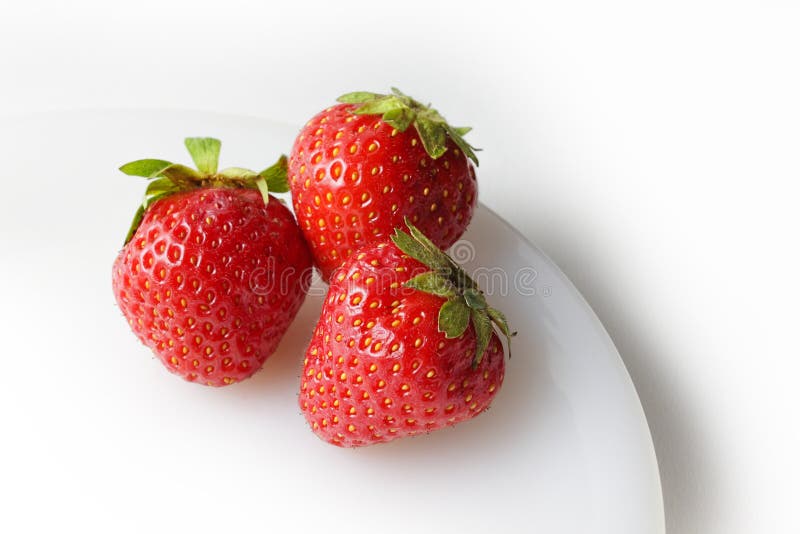 3 Strawberries stock photo. Image of plate, detail, macro - 25253166