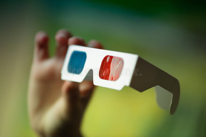 3D Glasses in hand stock photo. Image of hand, bicolor - 19215032