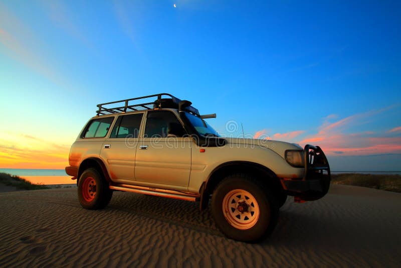 4WD on sand dune stock image. Image of coastline, landscape - 13953839