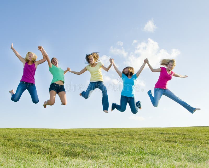 5 girls jumping in the air stock image. Image of hands - 15279041
