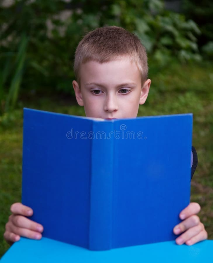 8-year Schoolboy Reading Book Stock Image - Image of children, young ...