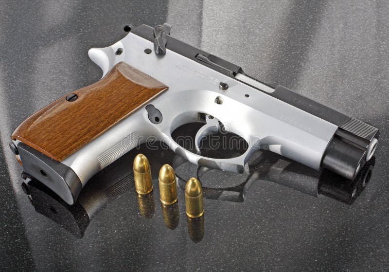 9mm handgun with bullets stock image. Image of weapons - 7313575