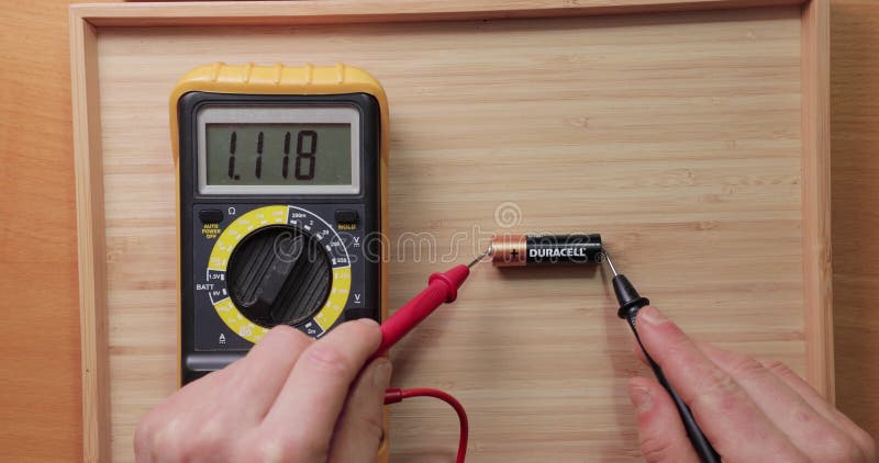 AA Battery Cells Voltage Checking Stock Video - Video of battery ...