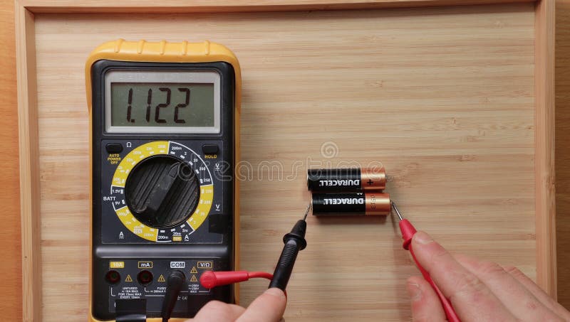 AA Battery Cells Voltage Checking Editorial Photography - Image of ...