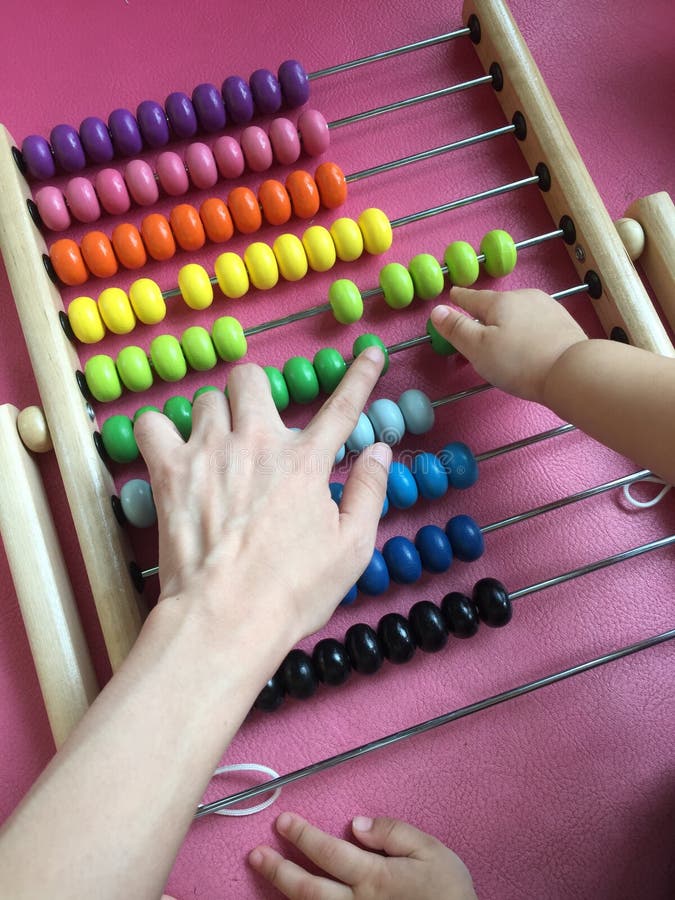 Abacus playing kids stock photo. Image of mathematics - 130923282
