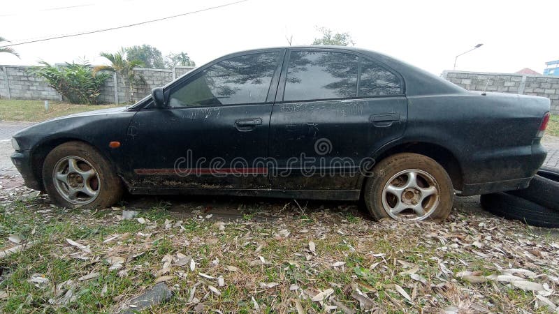 Abandoned black car sedan stock image. Image of broken - 261293965