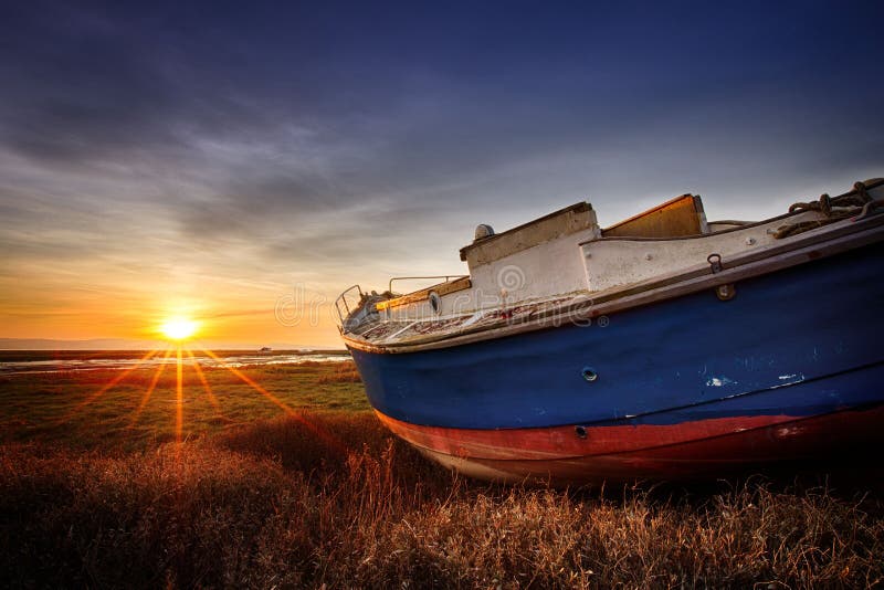 Abandoned Boat during Sunset on Heswall Marsh Coast, in the Wirral ... Abandoned Boat during Sunset on Heswall Marsh Coast, in the Wirral ...