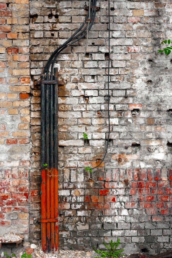 Abandoned Brick Wall with Cables Stock Photo - Image of concrete ...