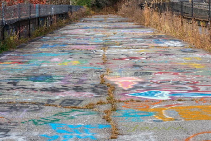 Abandoned Bridge Road Painted with Many Colorful Graffiti Designs Stock ...