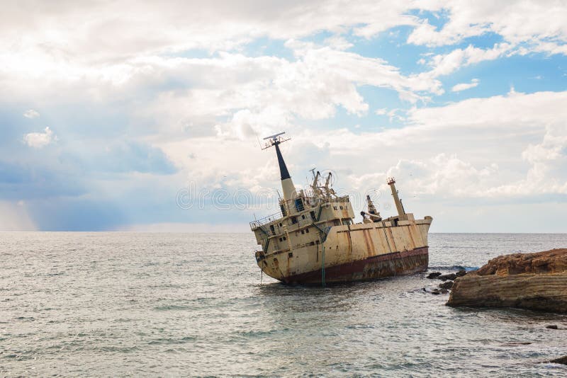 Abandoned Broken Ship-wreck Beached on Rocky Sea Shore. Stock Photo ...