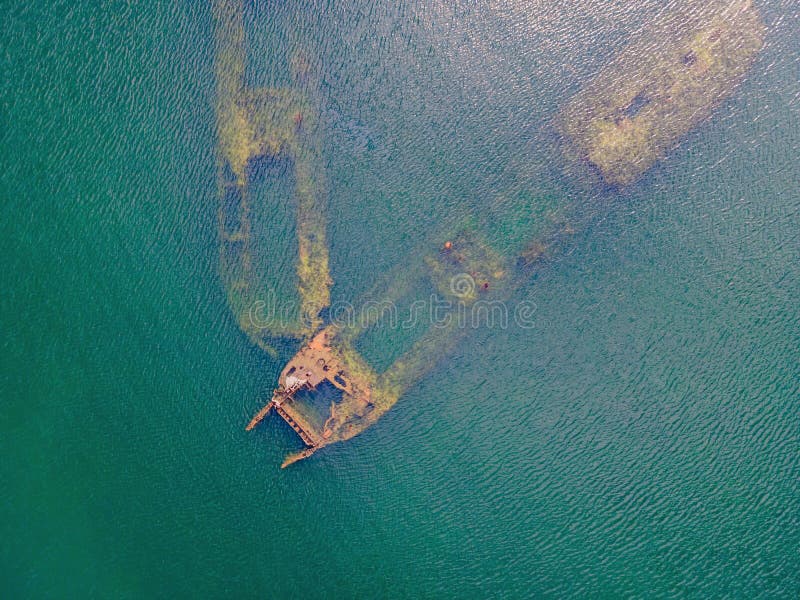 Abandoned Broken Shipwreck Sticking Out of the Sea Stock Photo - Image ...