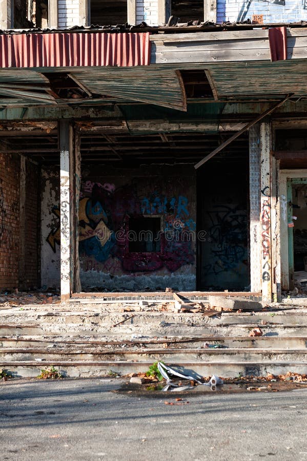 Abandoned Building Entrance with Graffiti and Weathered Decay Stock ...