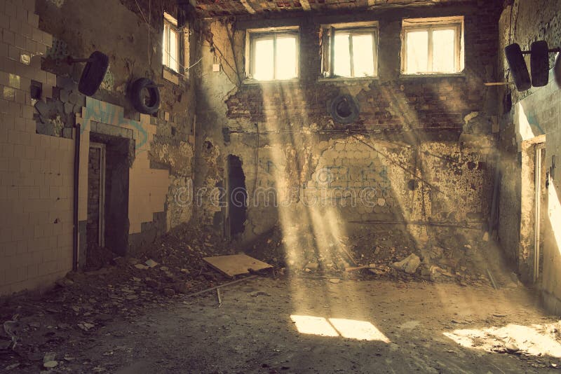 An Old Rundown Warehouse Wall with Two Wood Doors Stock Image - Image ...