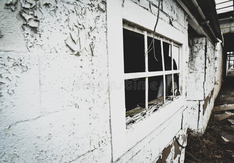 Abandoned Buildings on the Side of a Road with Broken Windows Stock ...