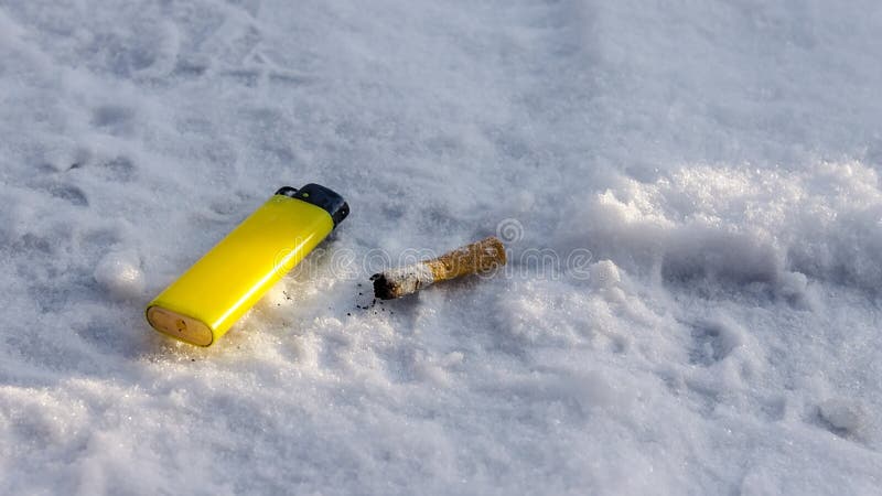 Cigarette and Lighter in the Snow Stock Image - Image of drug, city ...