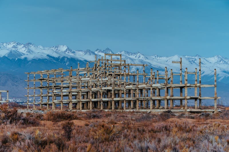 Abandoned Concrete Building on Mountains Background Stock Photo - Image ...