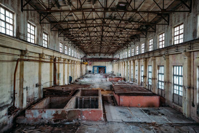 Abandoned Concrete Factory. Large Empty Industrial Hall Stock Photo ...