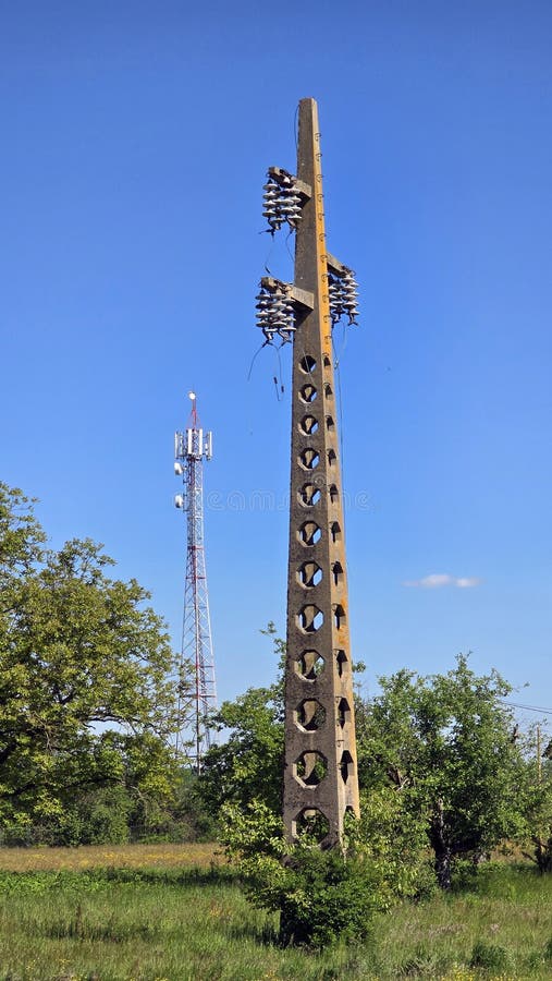 Concrete Utility Pole with Multiple Electrical Wires and Camera with ...