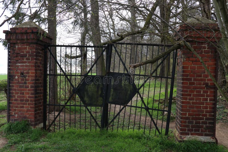 Abandoned and Damaged Metallic Gate in a Park Stock Image - Image of ...