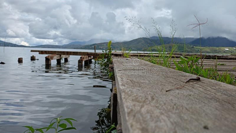 Abandoned Dock on the Edge of the Lake Stock Image - Image of edge ...