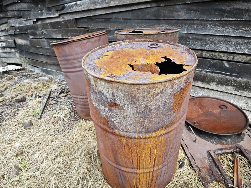 Abandoned Empty and Rusty Metal Barrel Left at the Junkyard. Stock ...