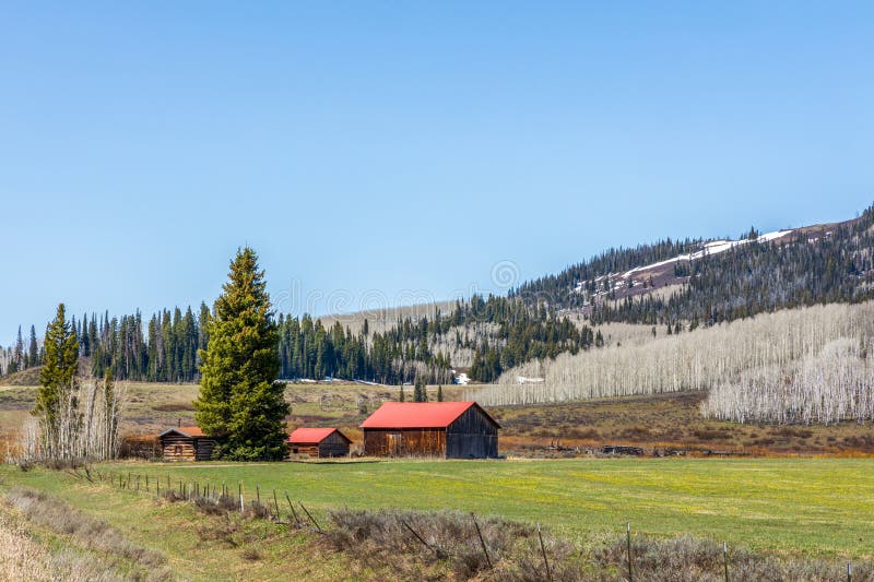 Abandoned Farm among the Green Field in the Mountains Stock Image ...