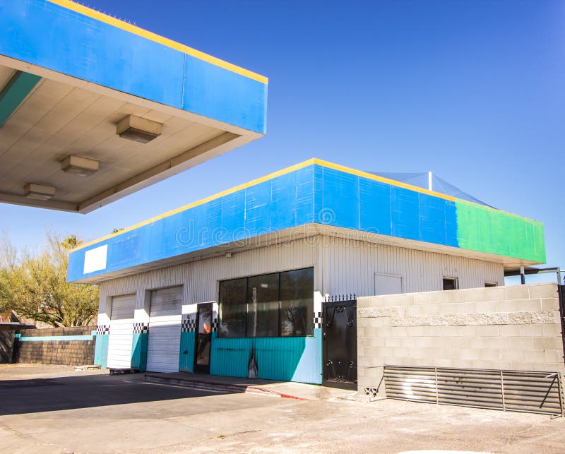 Abandoned Garage Building with Roll Up Doors Stock Photo - Image of ...