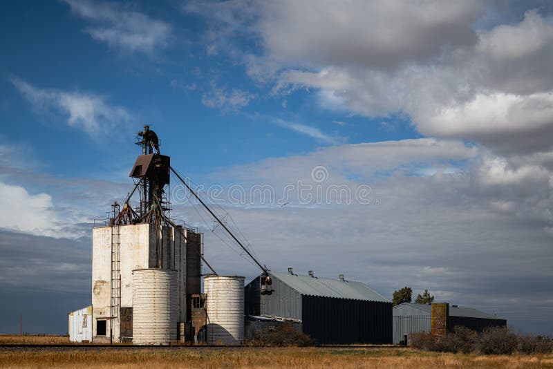 Abandoned Grain Silo with Cloudy Blue Sky and Morning Light Stock Image ...